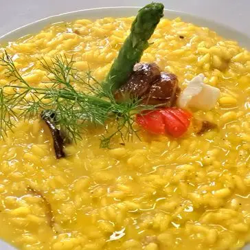 Risotto allo zafferano e fonduta di taleggio | Al.ta Cucina