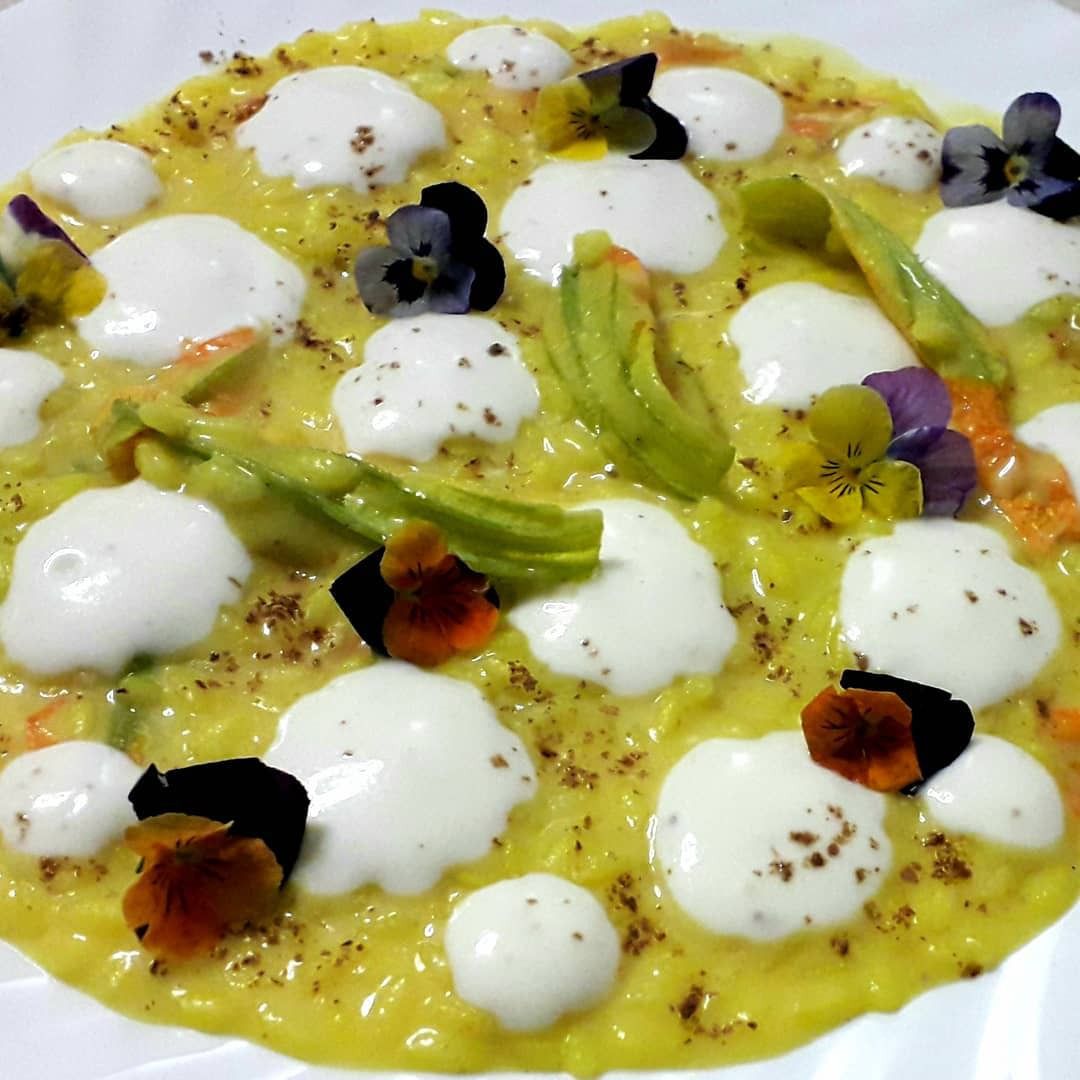 Risotto Sant’Andrea , curcuma, crema di burrata, fiori di zucca e ...